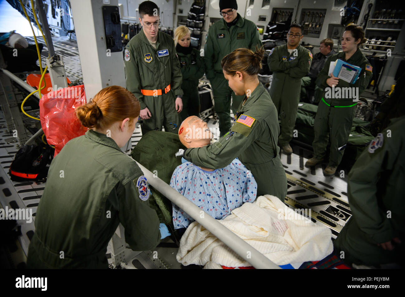 Members of the 86th Aeromedical Evacuation Squadron provide care to a ...