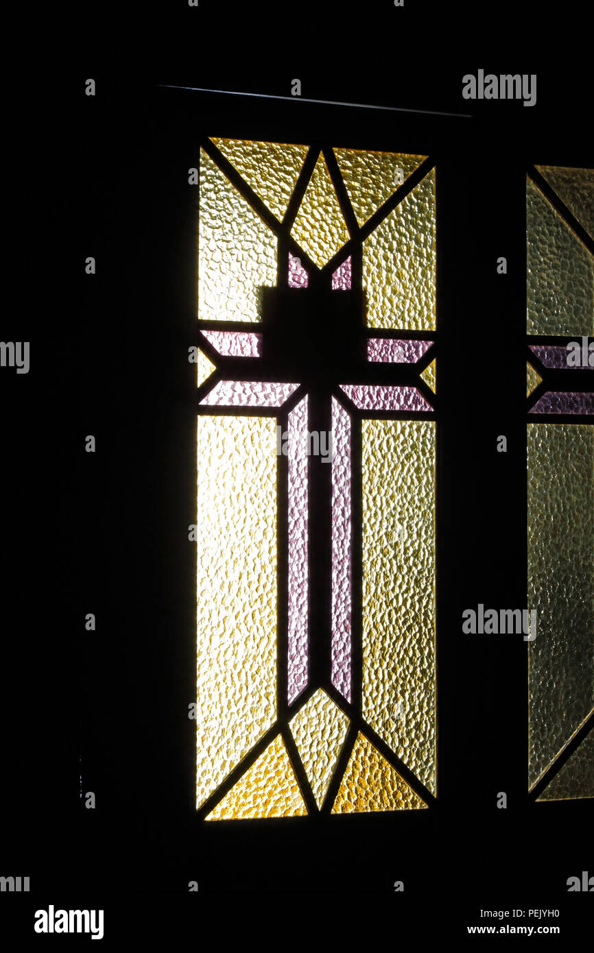 Humble stained glass window from a lateral door church in the north of ...