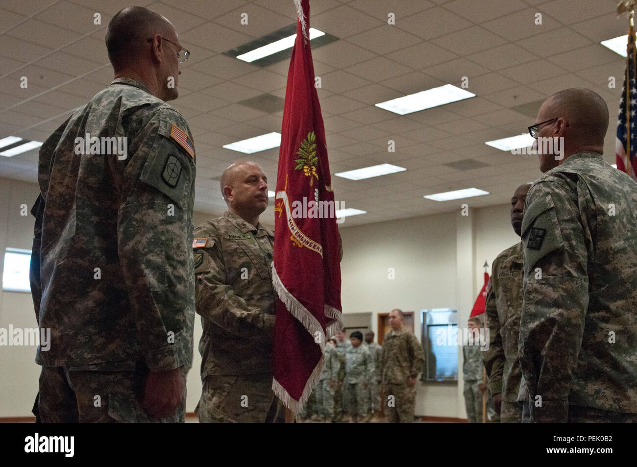 U.S. Army Reserve Lt. Col. Joseph Amon, holds the 363rd Engineer Battalion guidon signifying his ...