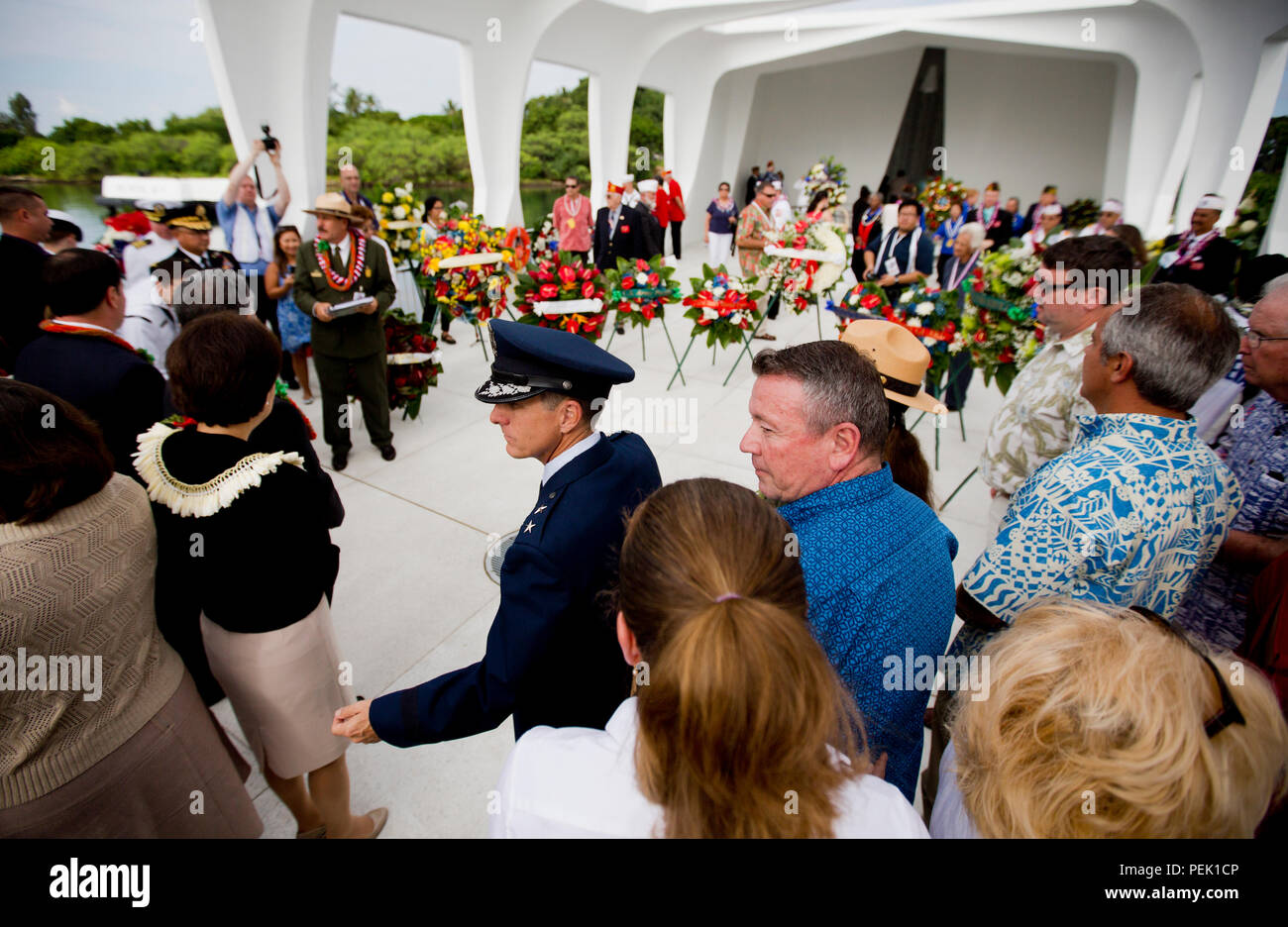 Participants wait for the Pearl Harbor Day Commemoration Ceremony to ...