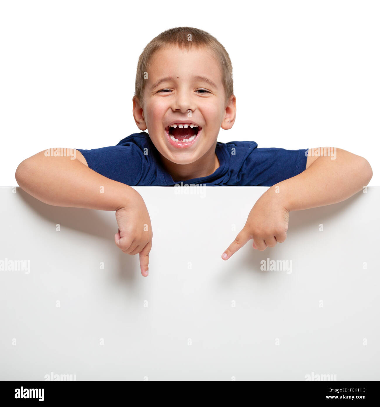 Billboard with a happy child on top. He points with his fingers down ...