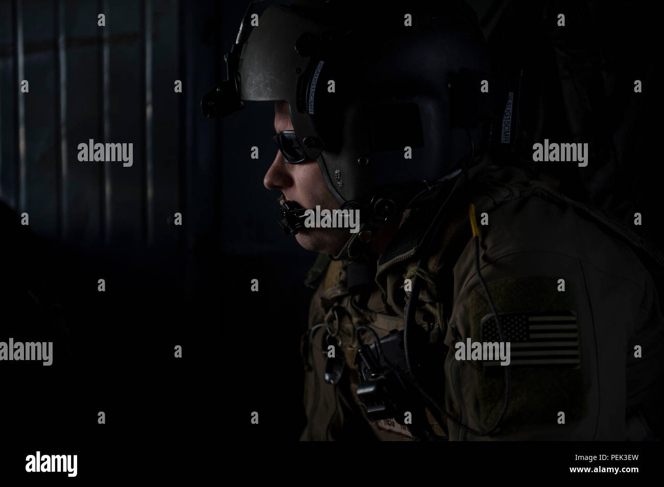 U.S. Air Force Tech. Sgt. Tim Chase flies on an Afghan Air Force Mi-17 ...