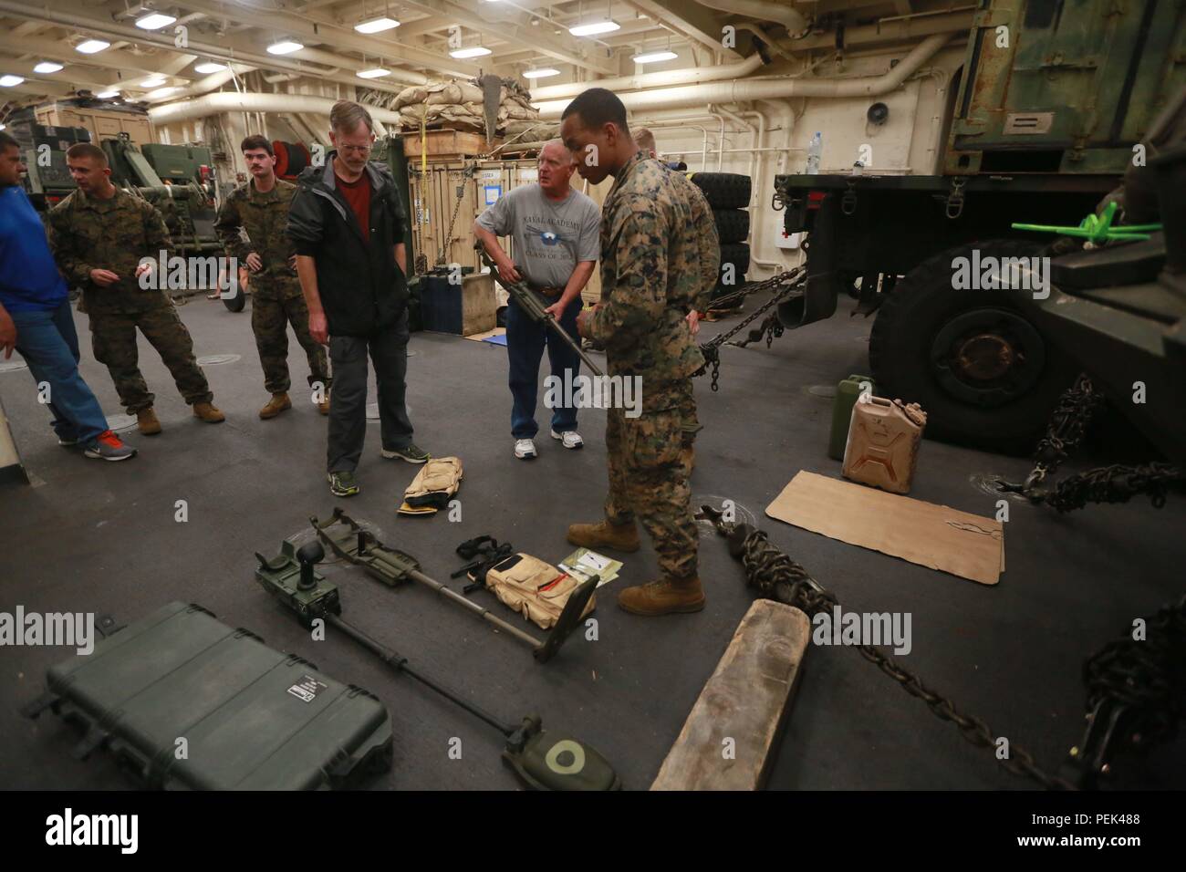 PACIFIC OCEAN (Dec. 9, 2015) U.S. Marine Sgt. Aaron Reed explains the ...