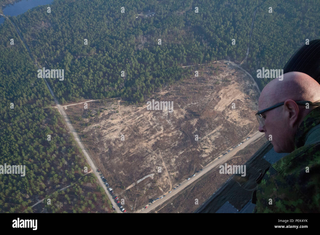 Canadian Armed Forces Sgt. Joe Hillier, a jumpmaster, conducts an ...