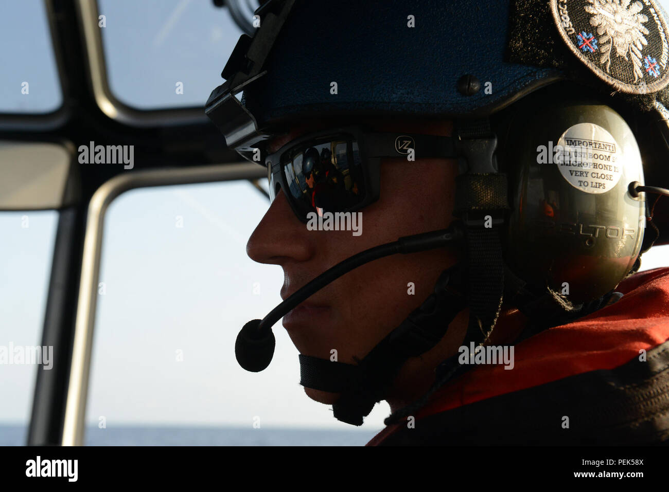 Petty Officer 3rd Class Jerry Renfroe, a machinery technician aboard ...