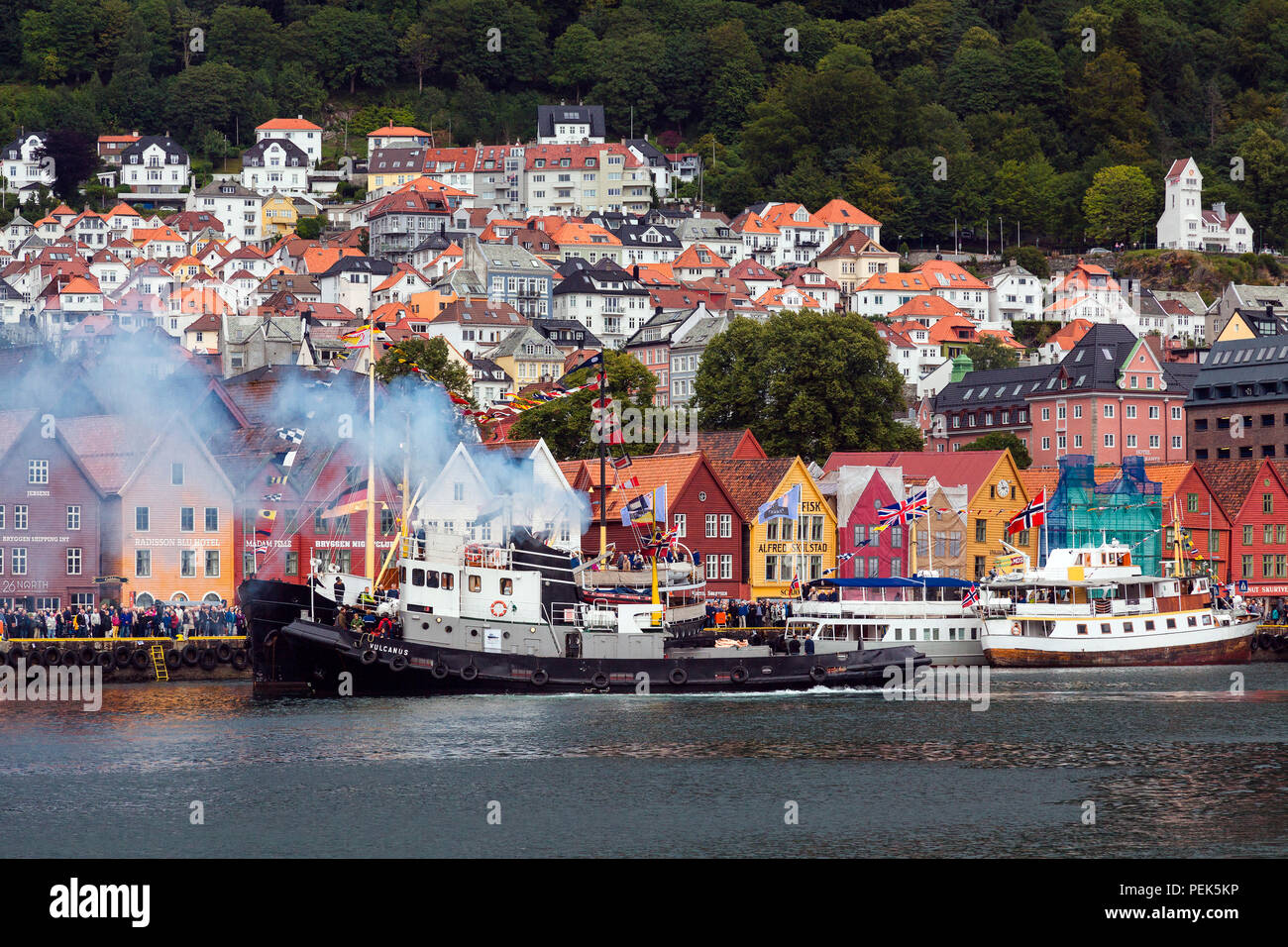 Veteran tug boat Vulcanus (b.1959) assisting veteran passenger ship ...
