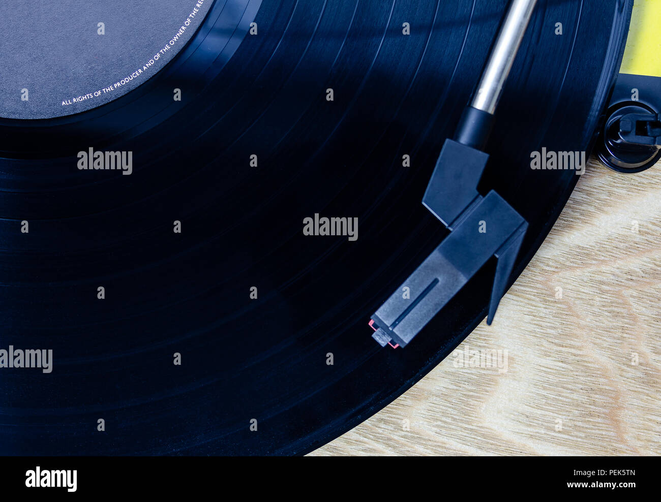 Playing a vinyl record on a record player Stock Photo - Alamy