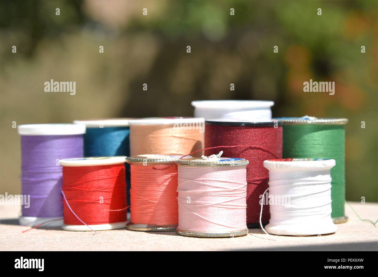 colorful spools of thread Stock Photo - Alamy