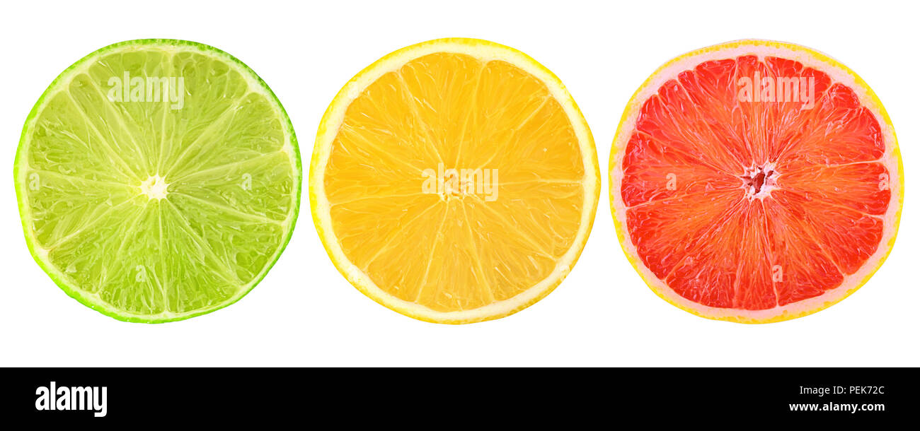 Isolated citrus slices. Fresh citrus fruits cut in half (grapefruit ...