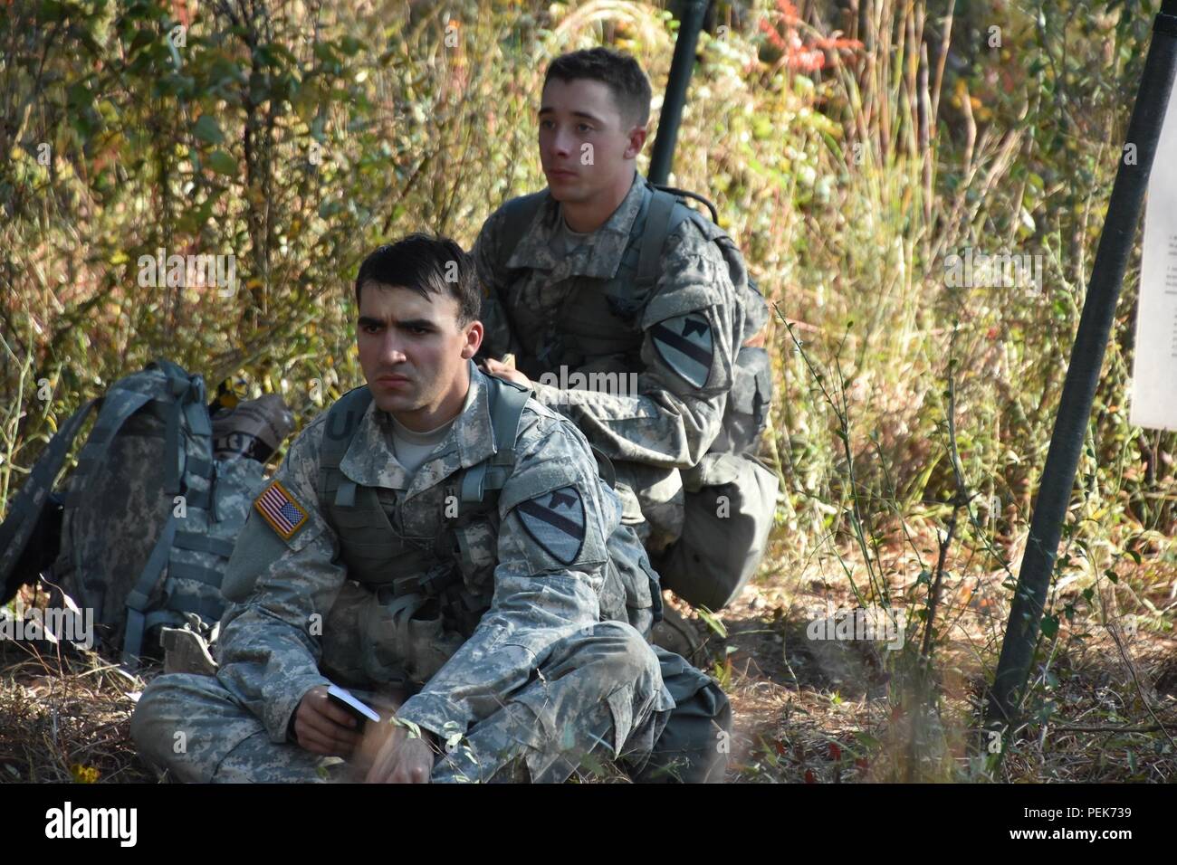 Spc. Kyle Grover and Pvt. Taylor Saine, both infantrymen with Company A ...