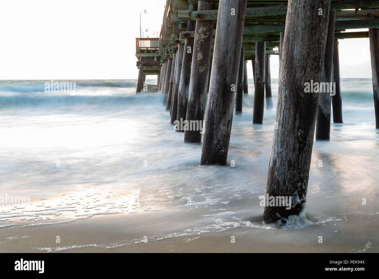 The waves splash along the Sandbridge Fishing Pier in Sandbridge ...