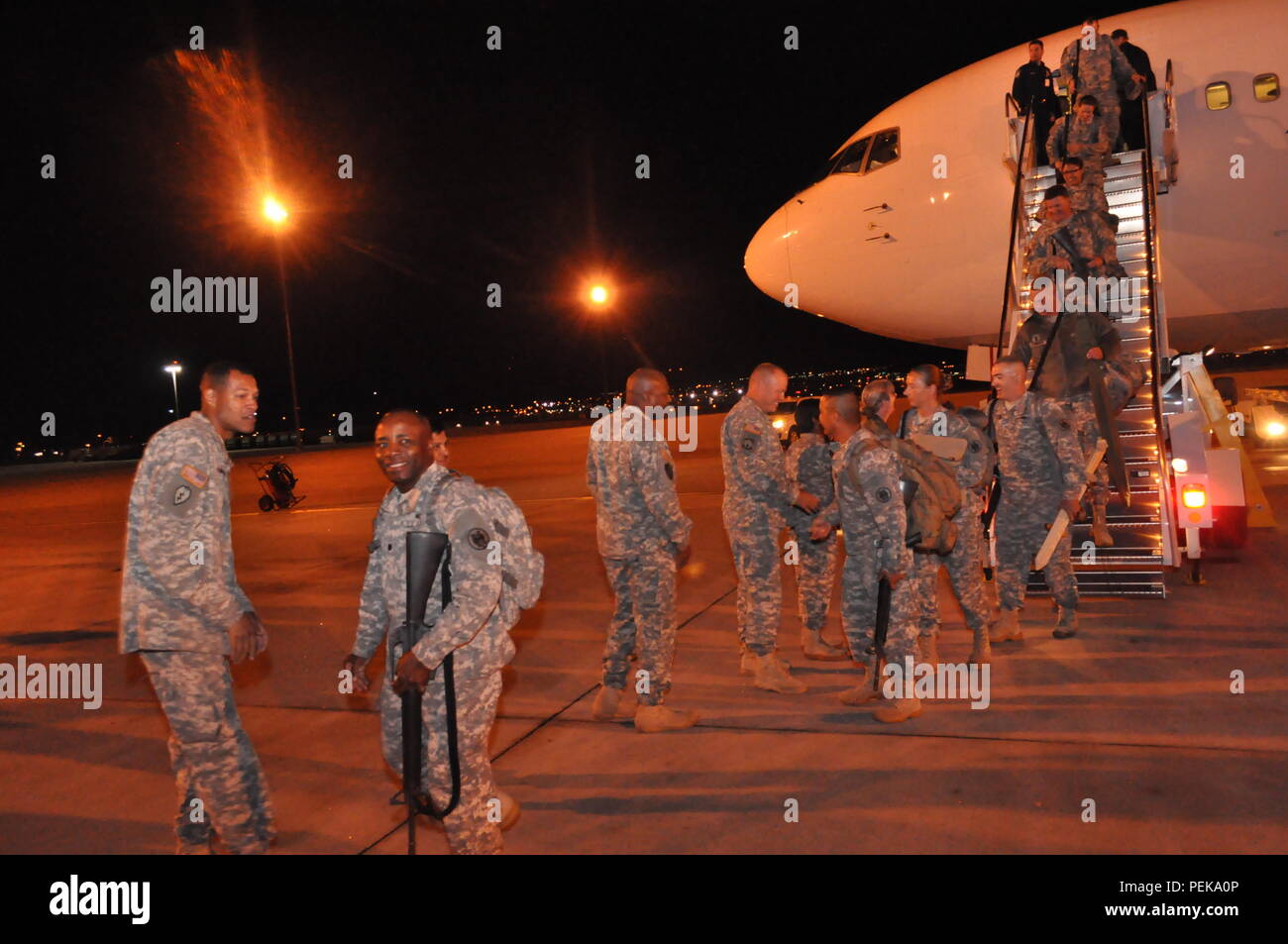 Soldiers assigned to the 324th Military Police Battalion deplane the ...