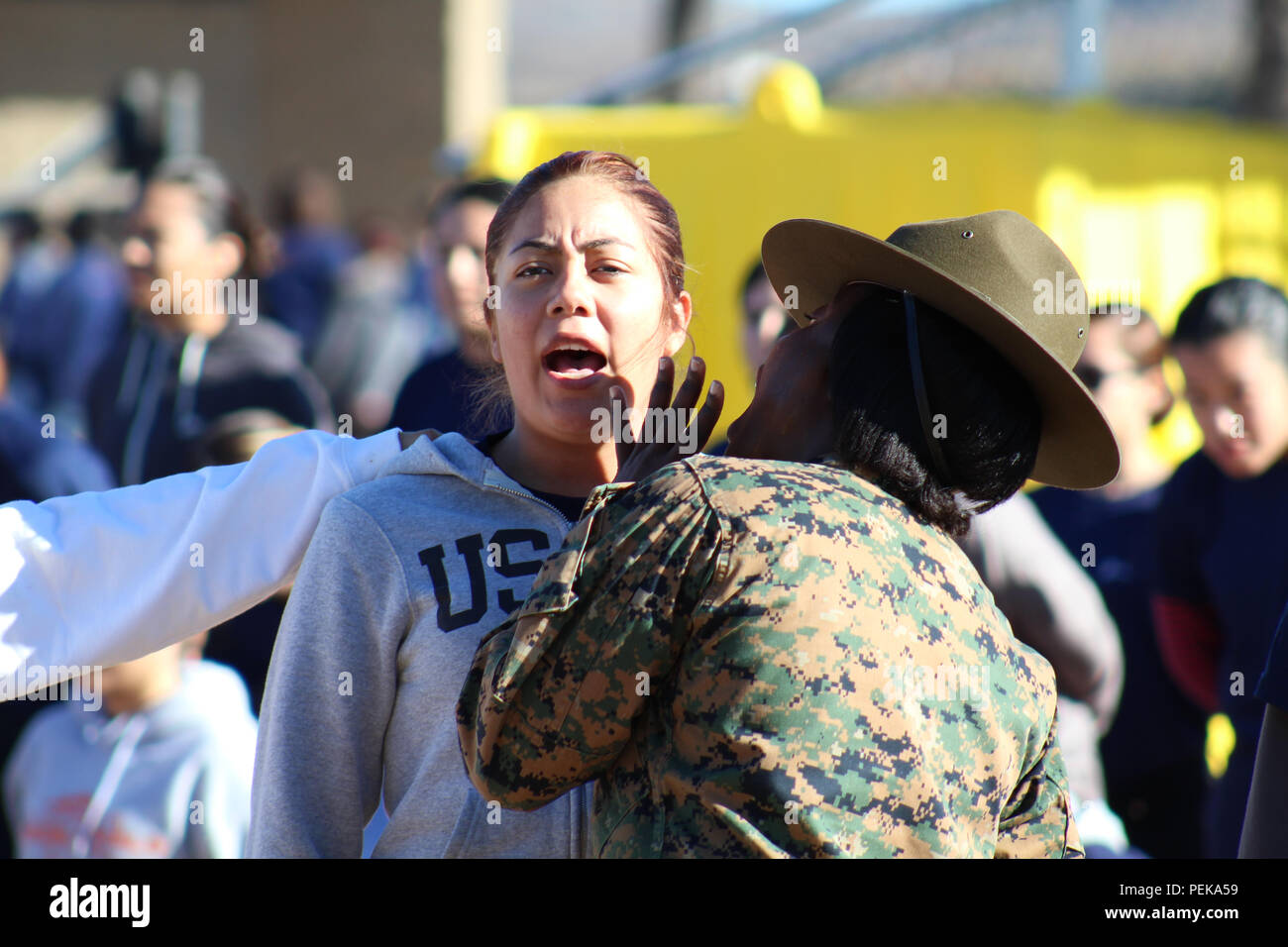 A Marine enlistee responds to Drill Instructor Staff Sgt. Maria S ...