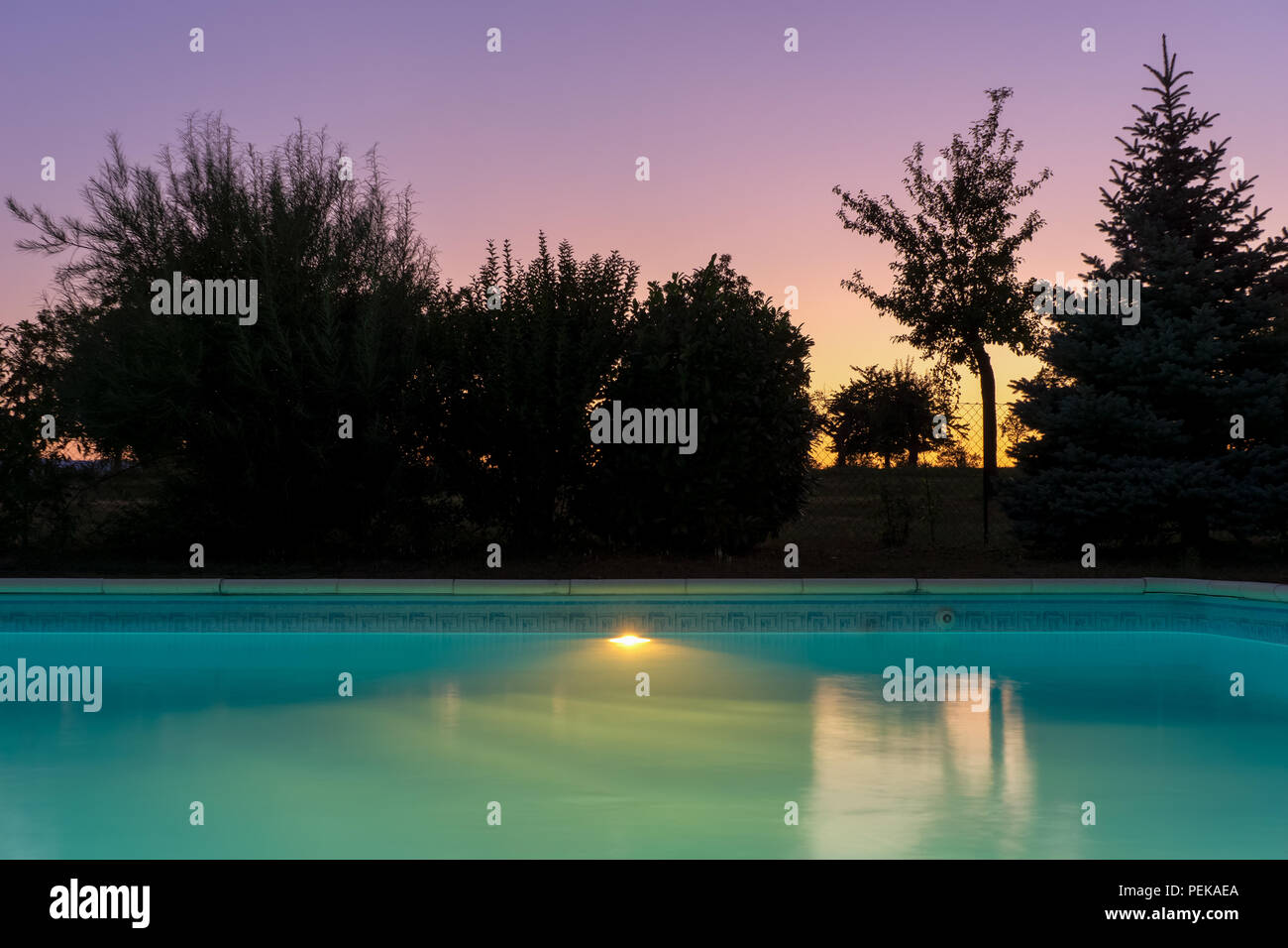 Outdoor swimming pool dusk hi-res stock photography and images - Alamy