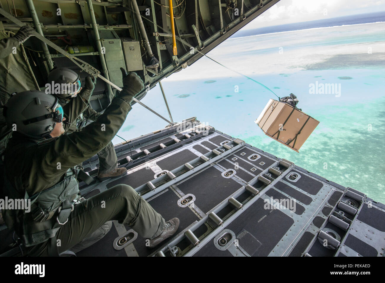 36th Airlift Squadron loadmaster and Col. TY Chamberlain, 36th Wing ...