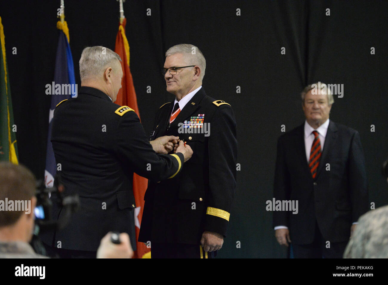 U.S. Army Gen. Frank Grass, chief of the National Guard Bureau, pins ...