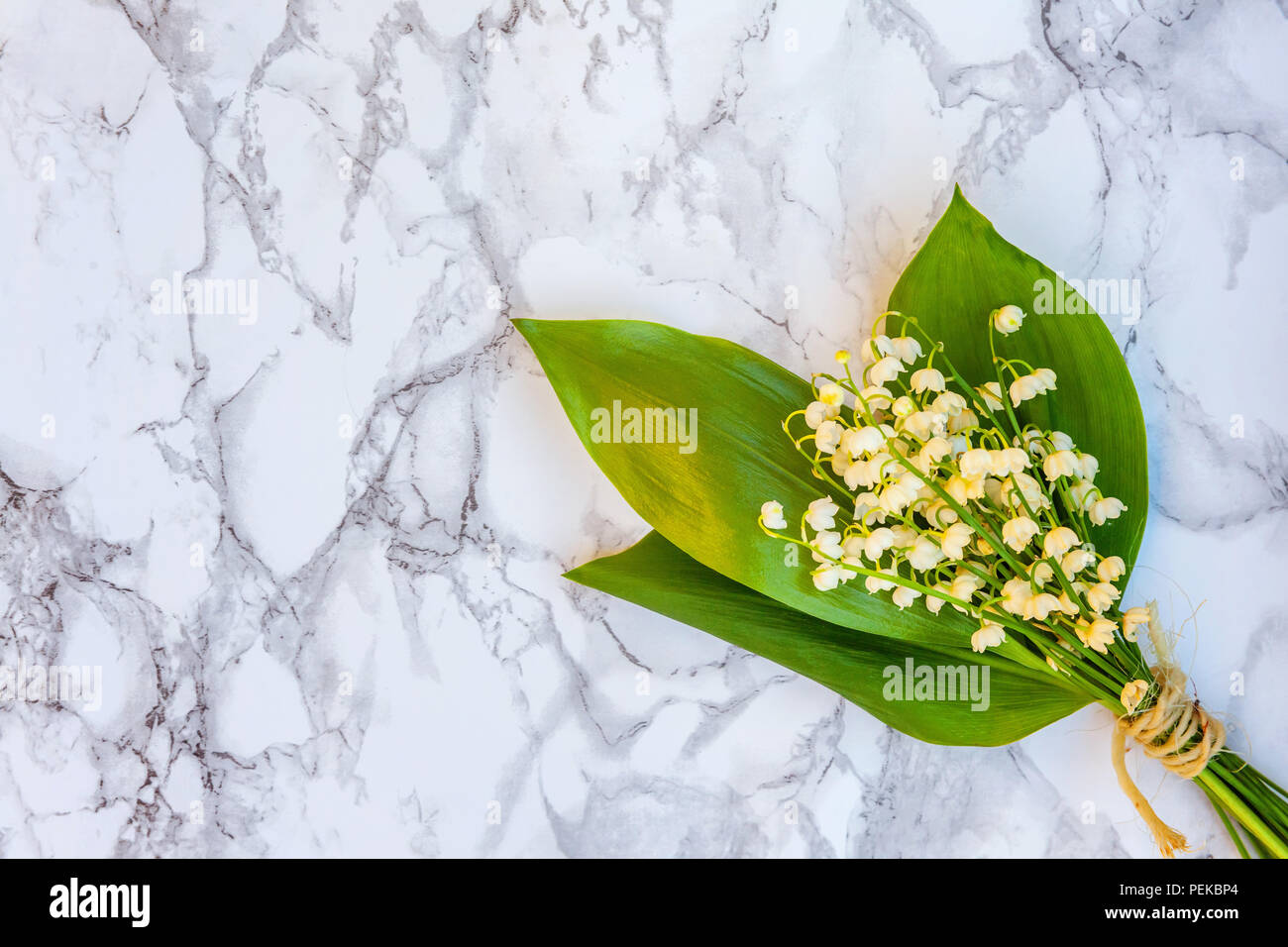 Bouquet of flowers beautiful smell lily of the valley or may-lily in ...