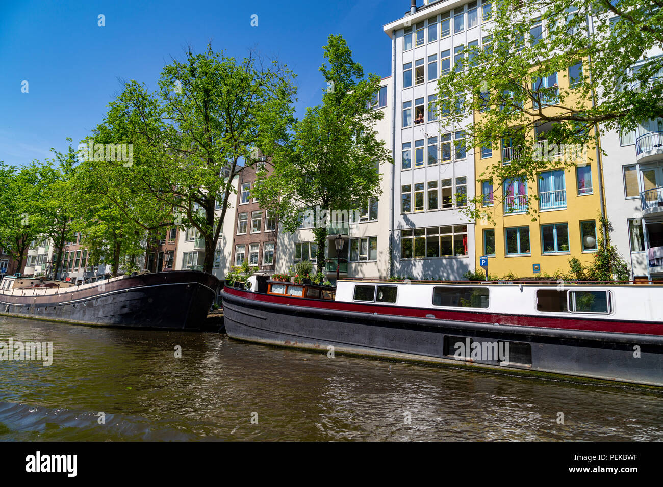 Floating houses in Amsterdam, Netherlands Stock Photo - Alamy
