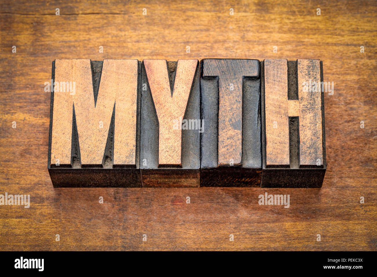 myth word abstract in letterpress wood type printing blocks against ...