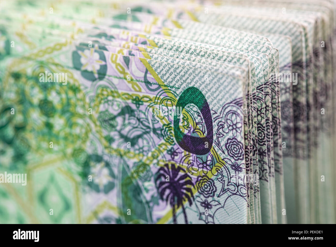Close up of 5 Qatari Riyal bank note with selective focus Stock Photo ...
