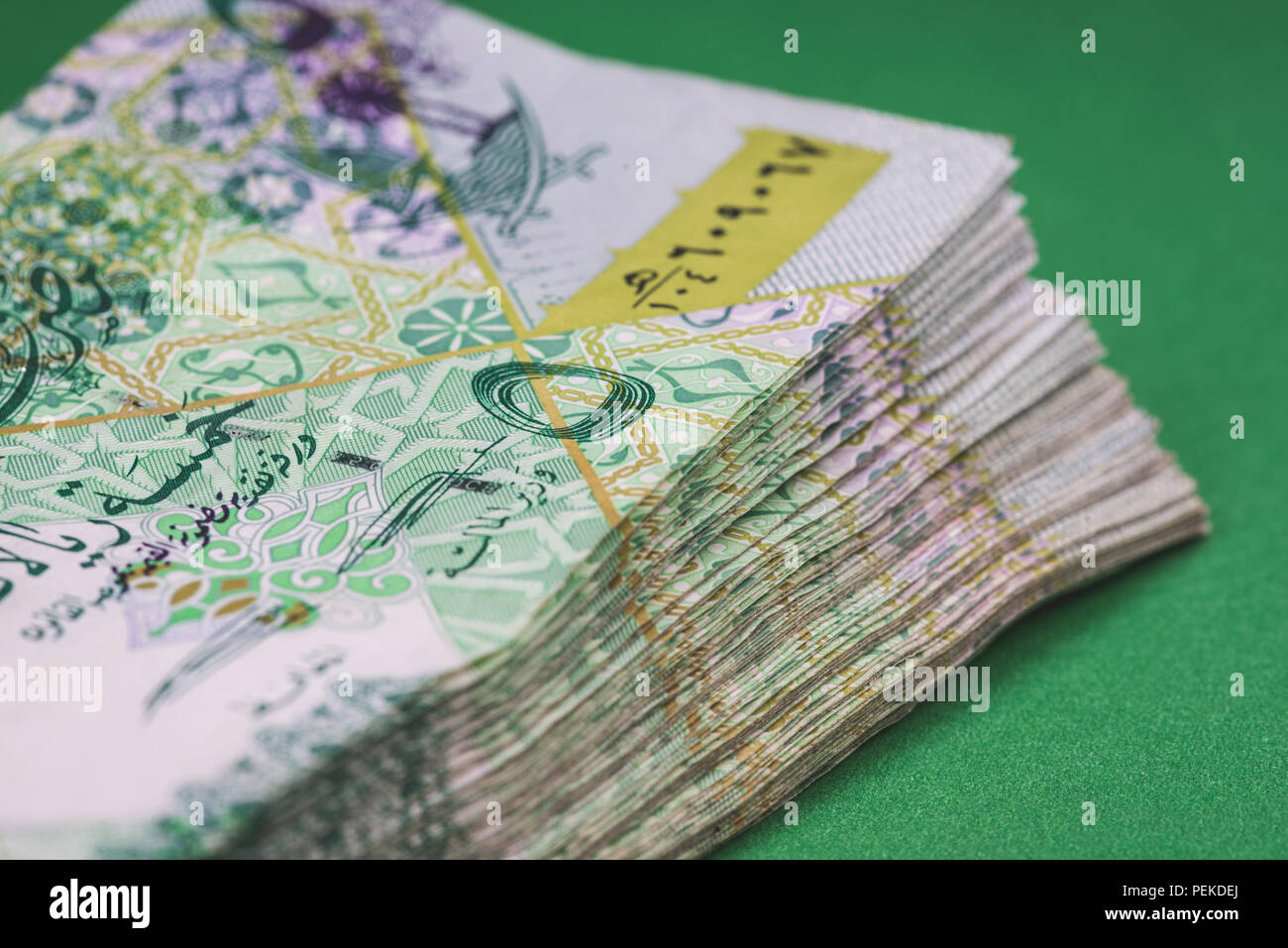 Close up of 5 Qatari Riyal bank note with selective focus Stock Photo ...