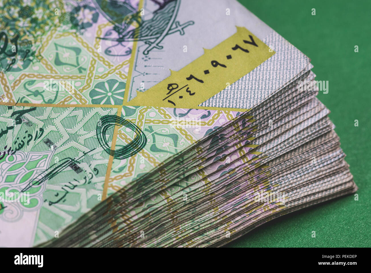 Close up of 5 Qatari Riyal bank note with selective focus Stock Photo ...