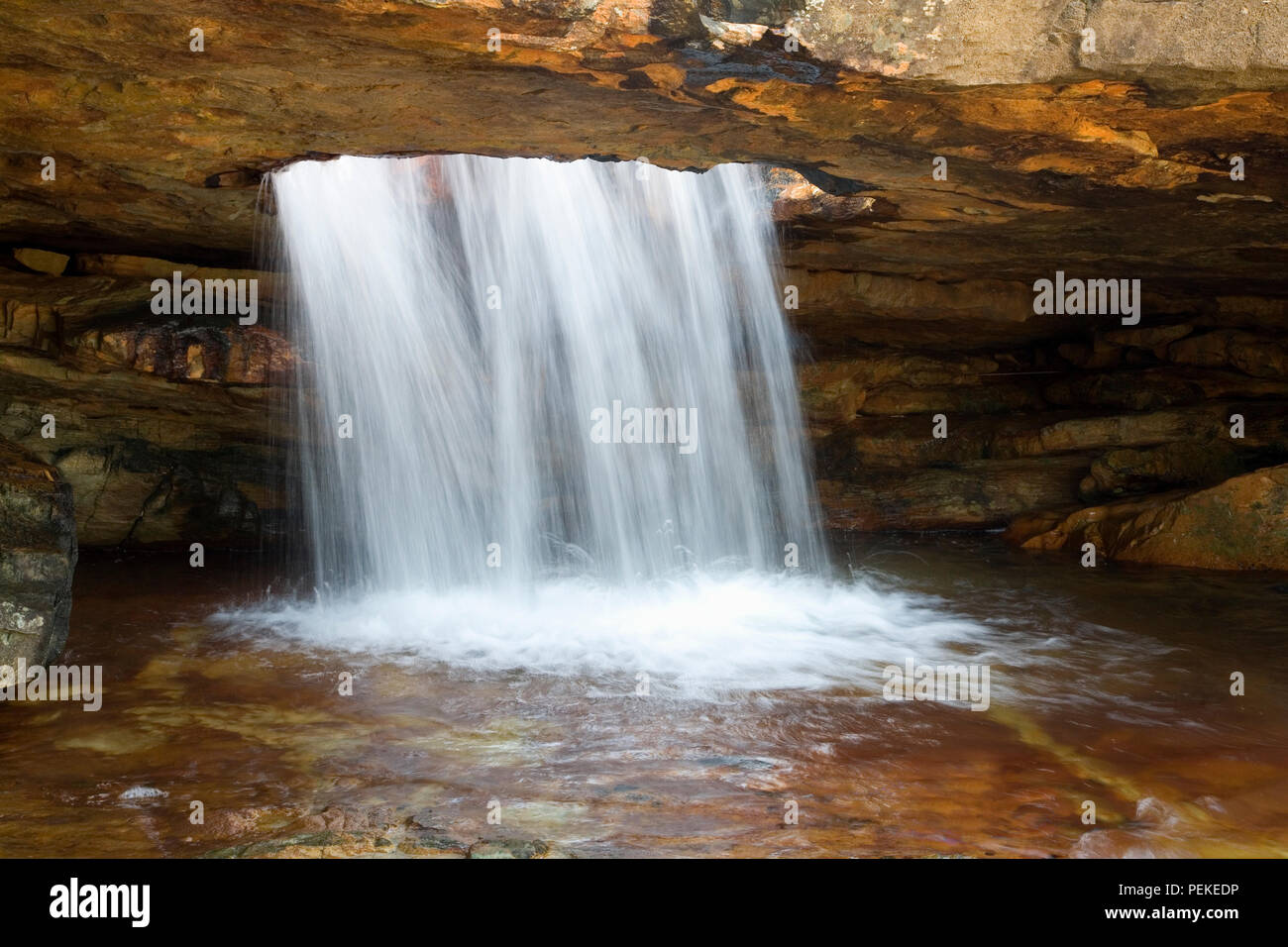Water cascade through rocks Stock Photo - Alamy