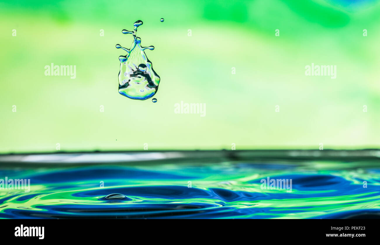 water drop falling on the water surface Stock Photo - Alamy
