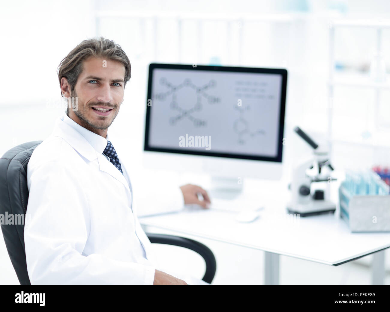 Scientist sitting hi-res stock photography and images - Alamy