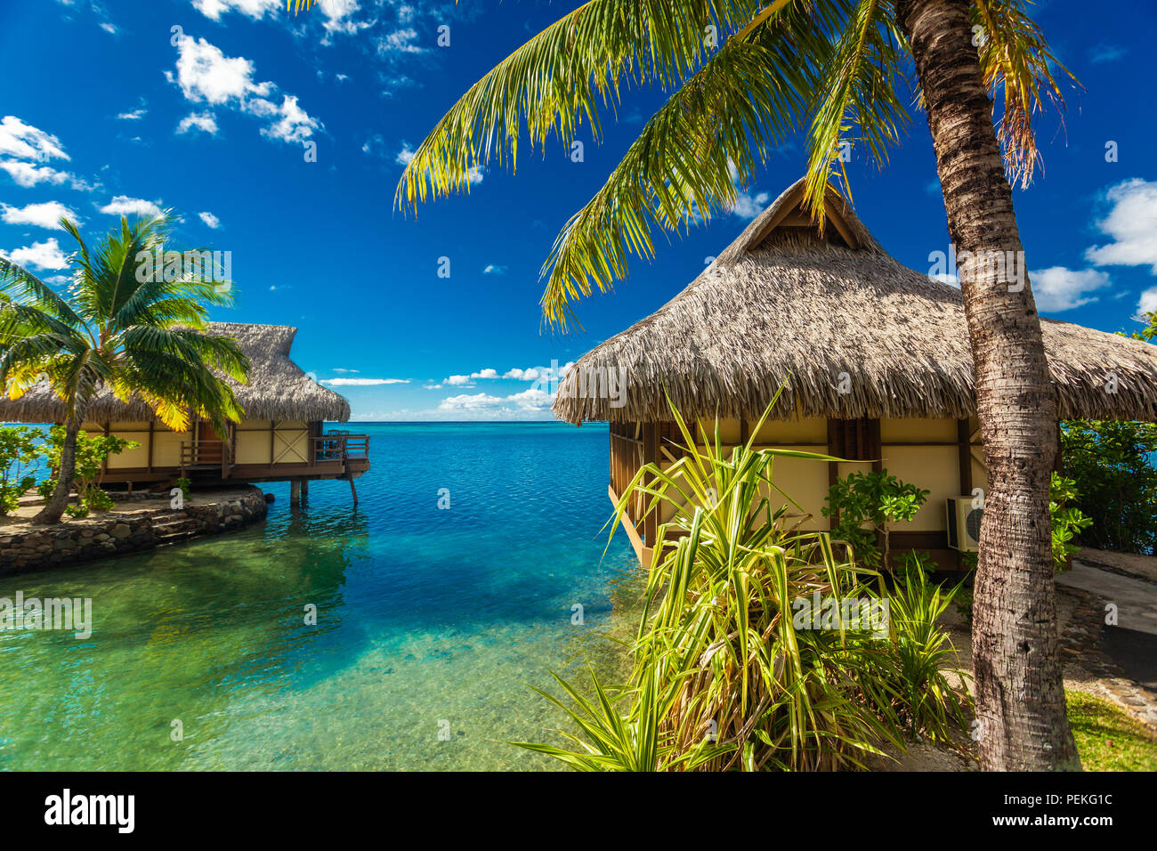 Over water bungalows and amazing green lagoon, Moorea, French Polynesia ...