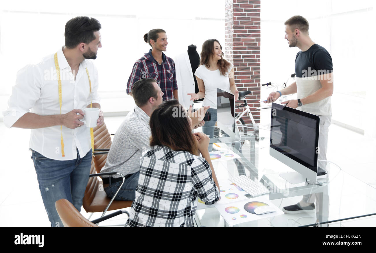 group of designers working in a modern office Stock Photo - Alamy