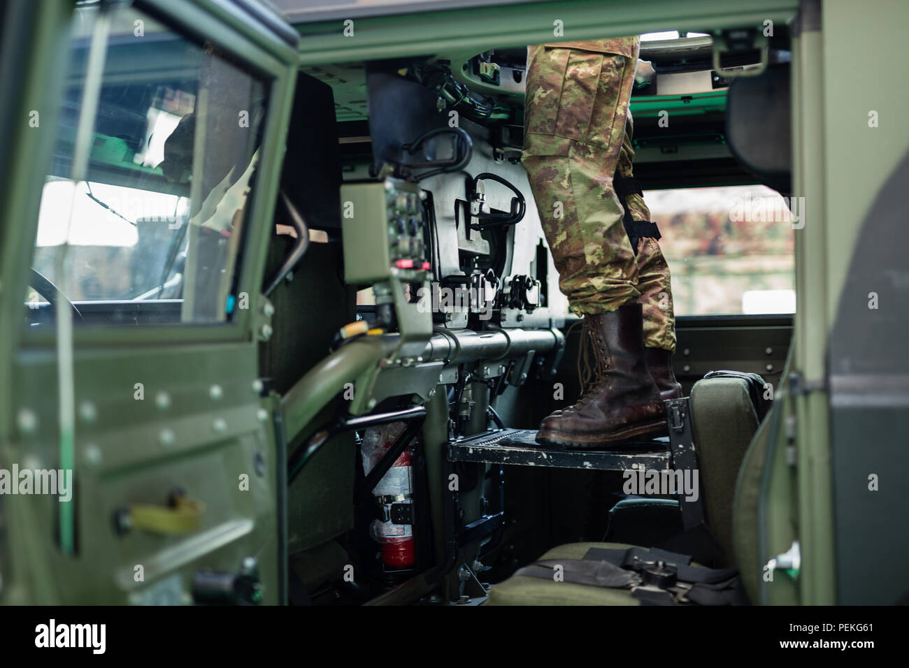View of a Soldier Standing inside the Military Vehicle Stock Photo - Alamy