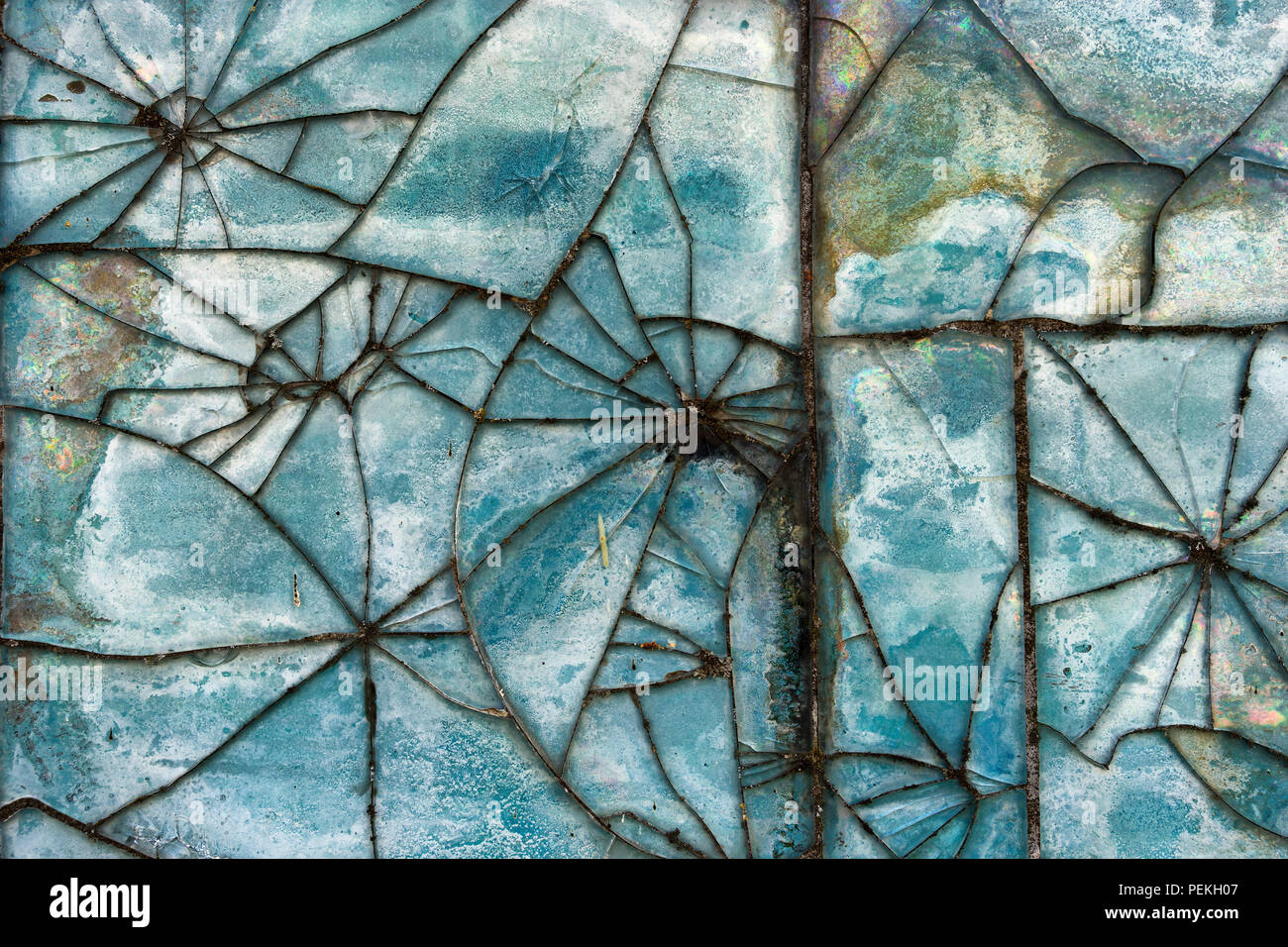 Patterns of broken glass tile on the wall Stock Photo - Alamy