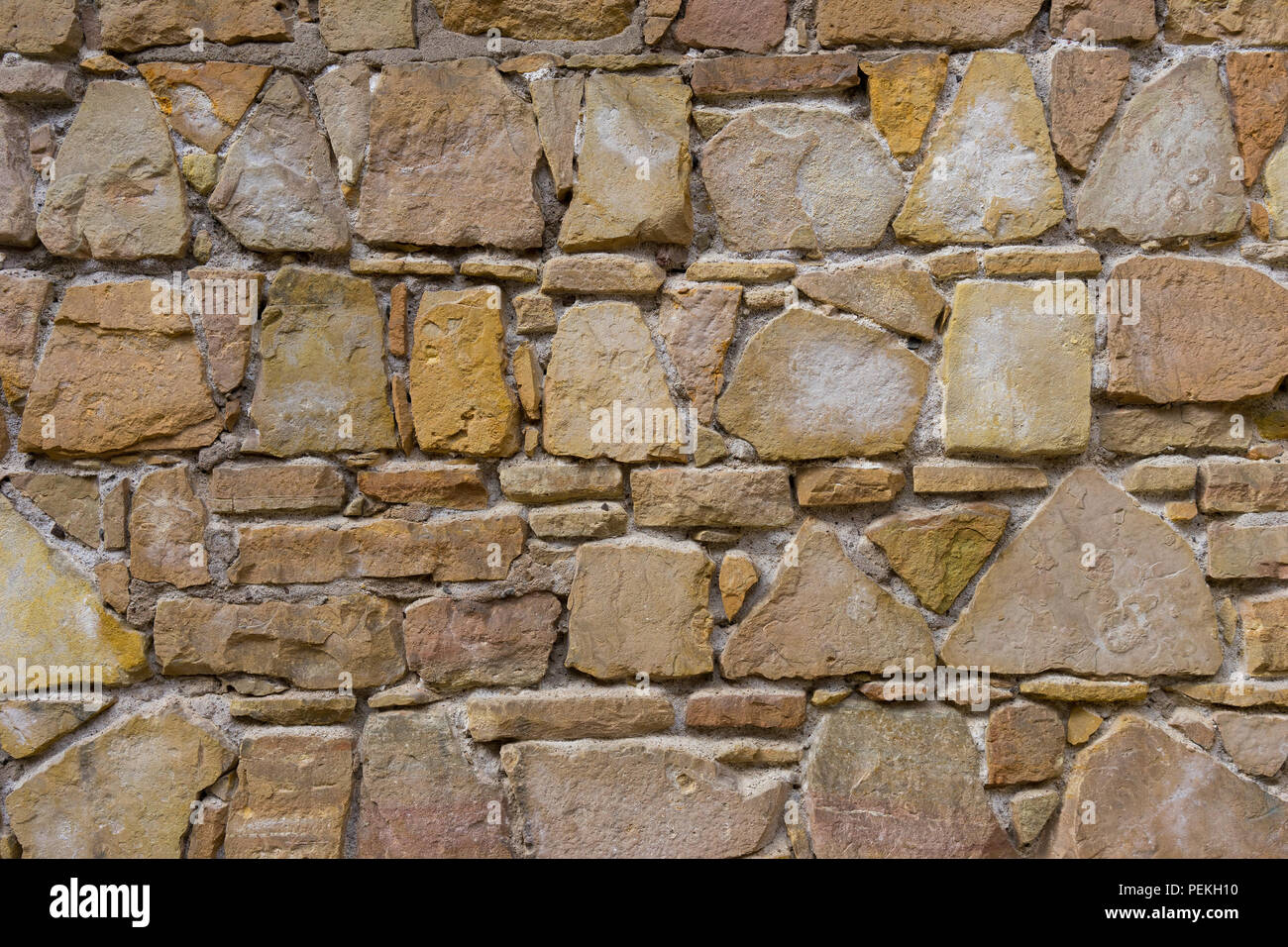 Wall of a house made of stones of different shapes and sizes Stock ...