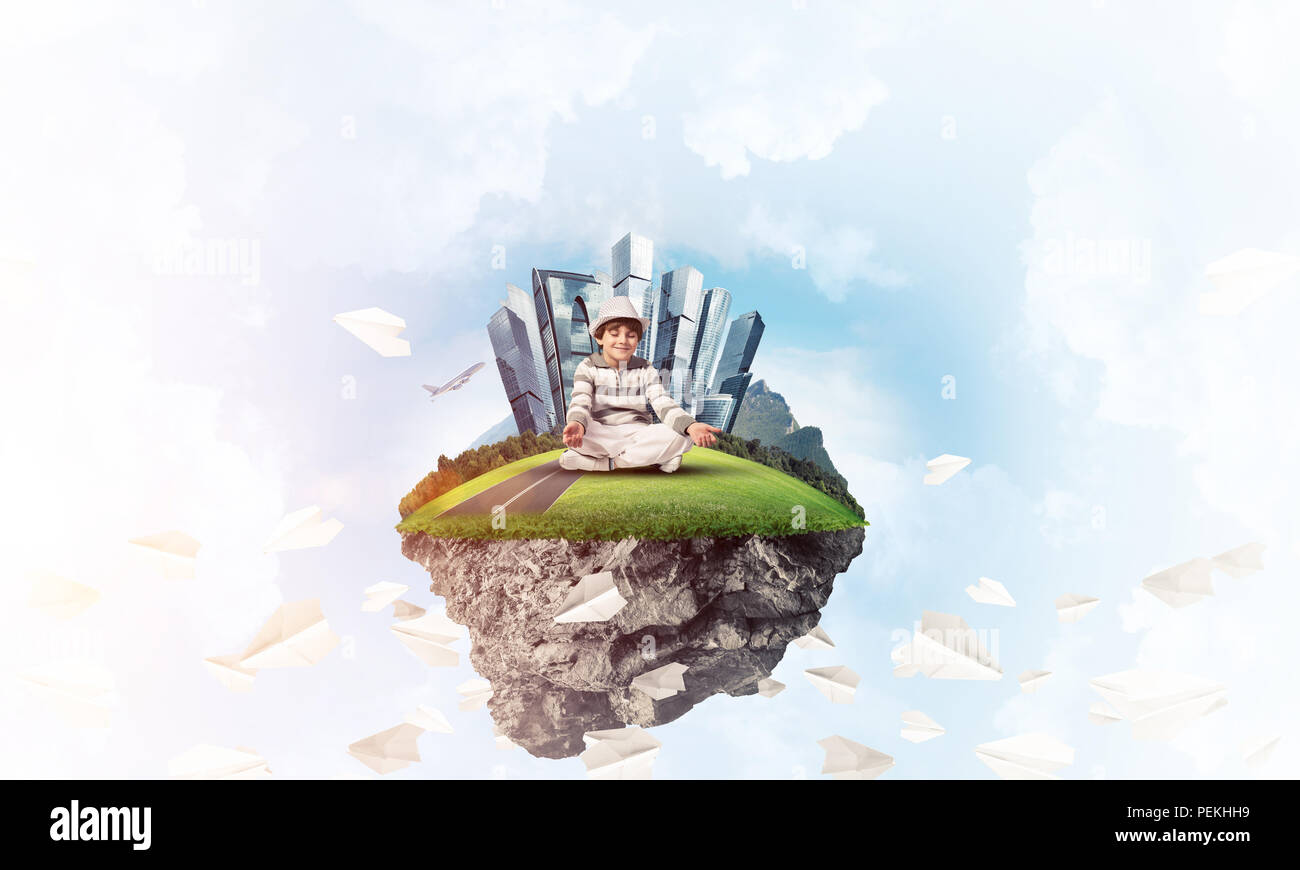 Little boy keeping mind conscious Stock Photo - Alamy