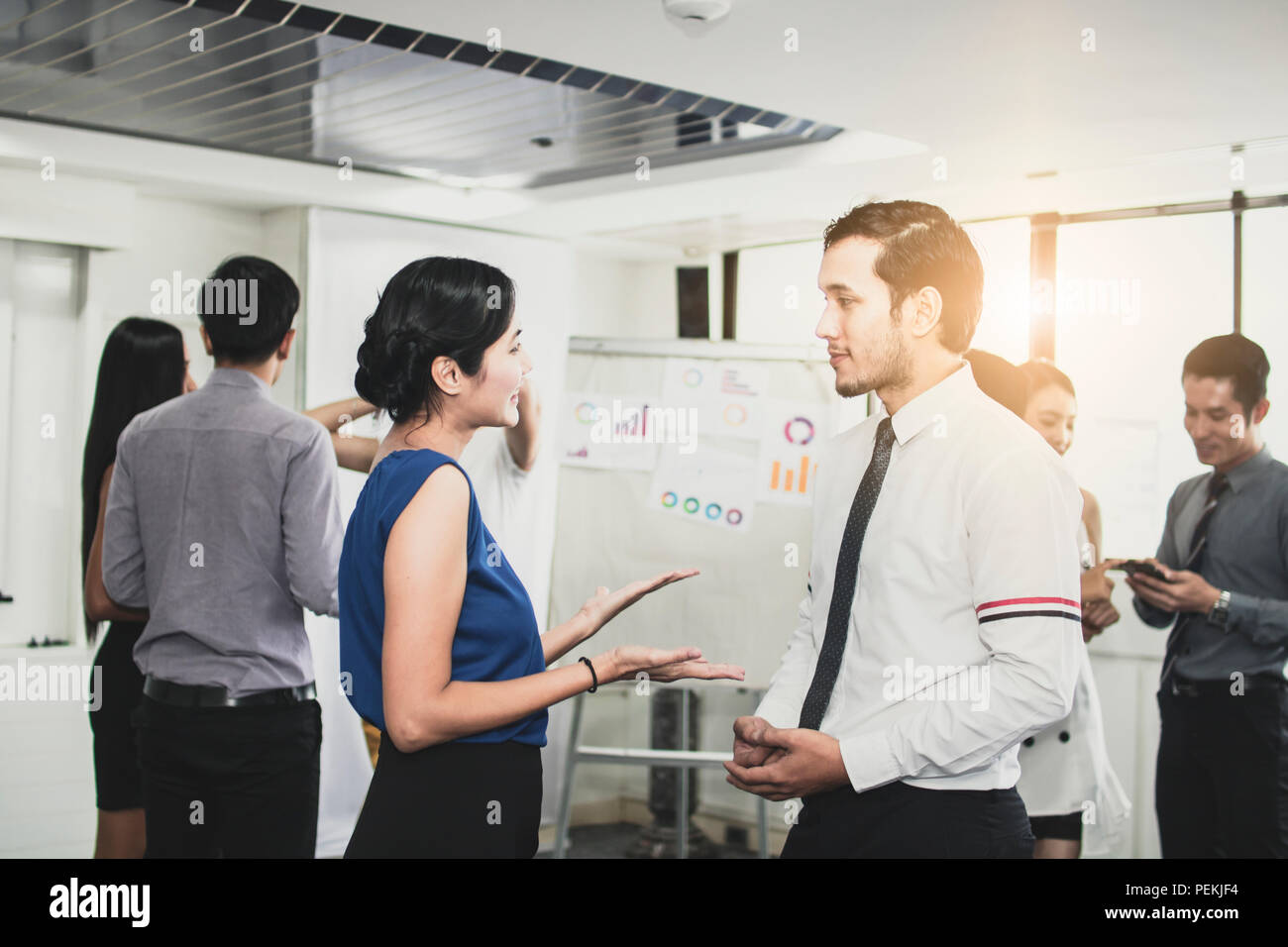 New Asian business operators talking and discussion with SME specialist ...