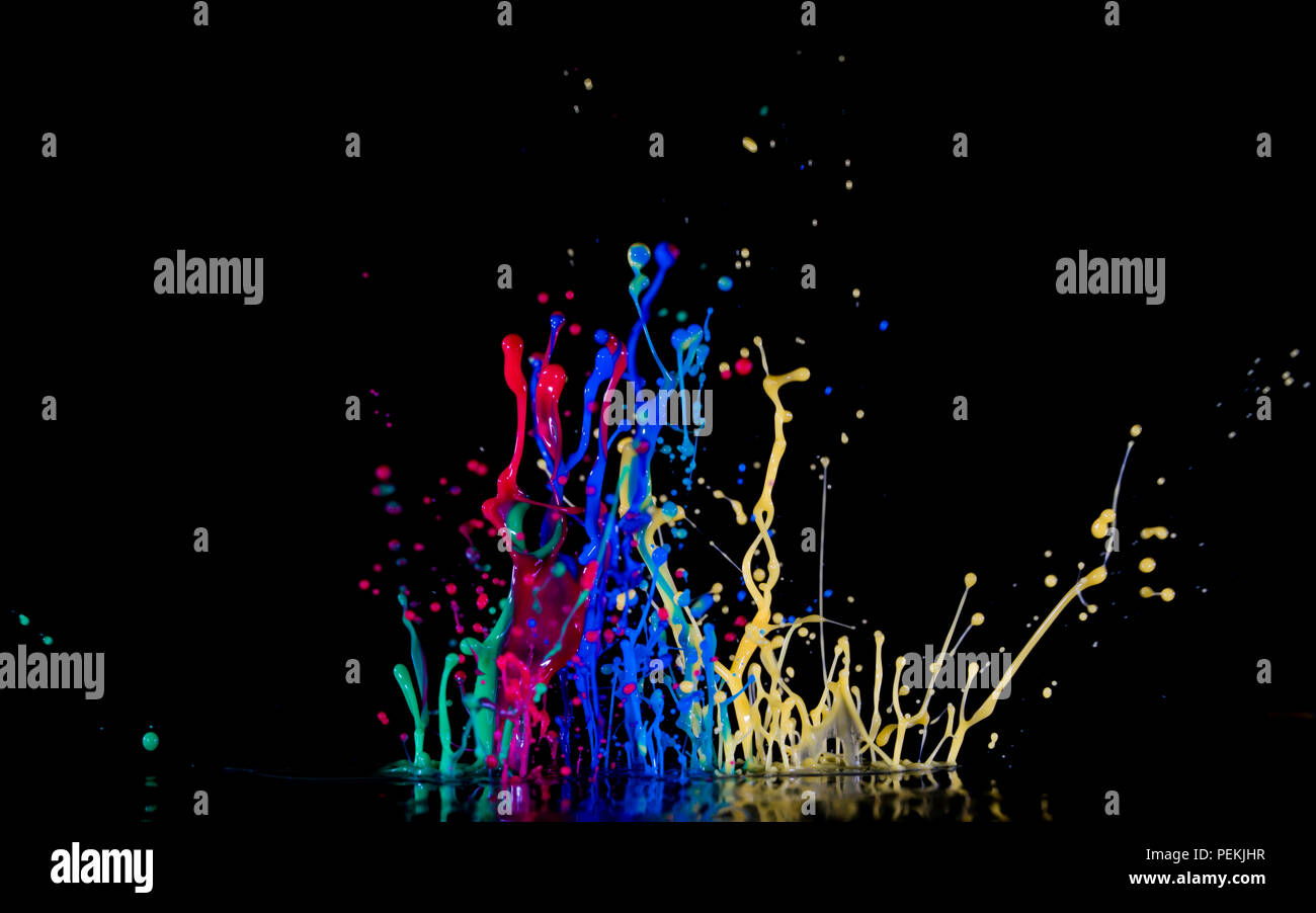 abstract color splash isolated on black background Stock Photo - Alamy