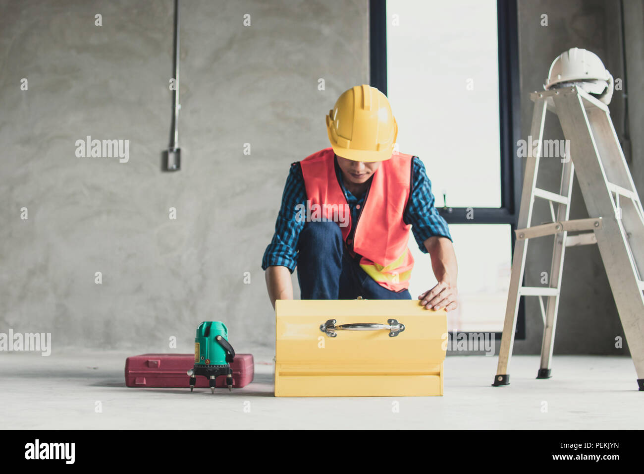 worker finding tools in construction box in working site Stock Photo ...