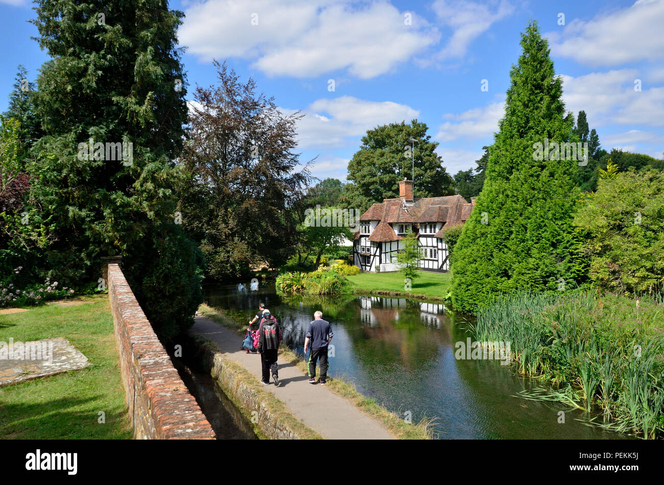 Half-timbered house and Loos Brooks - stream flowing through the middle ...