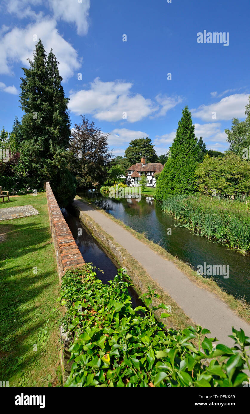 Half-timbered house and Loos Brooks - stream flowing through the middle ...
