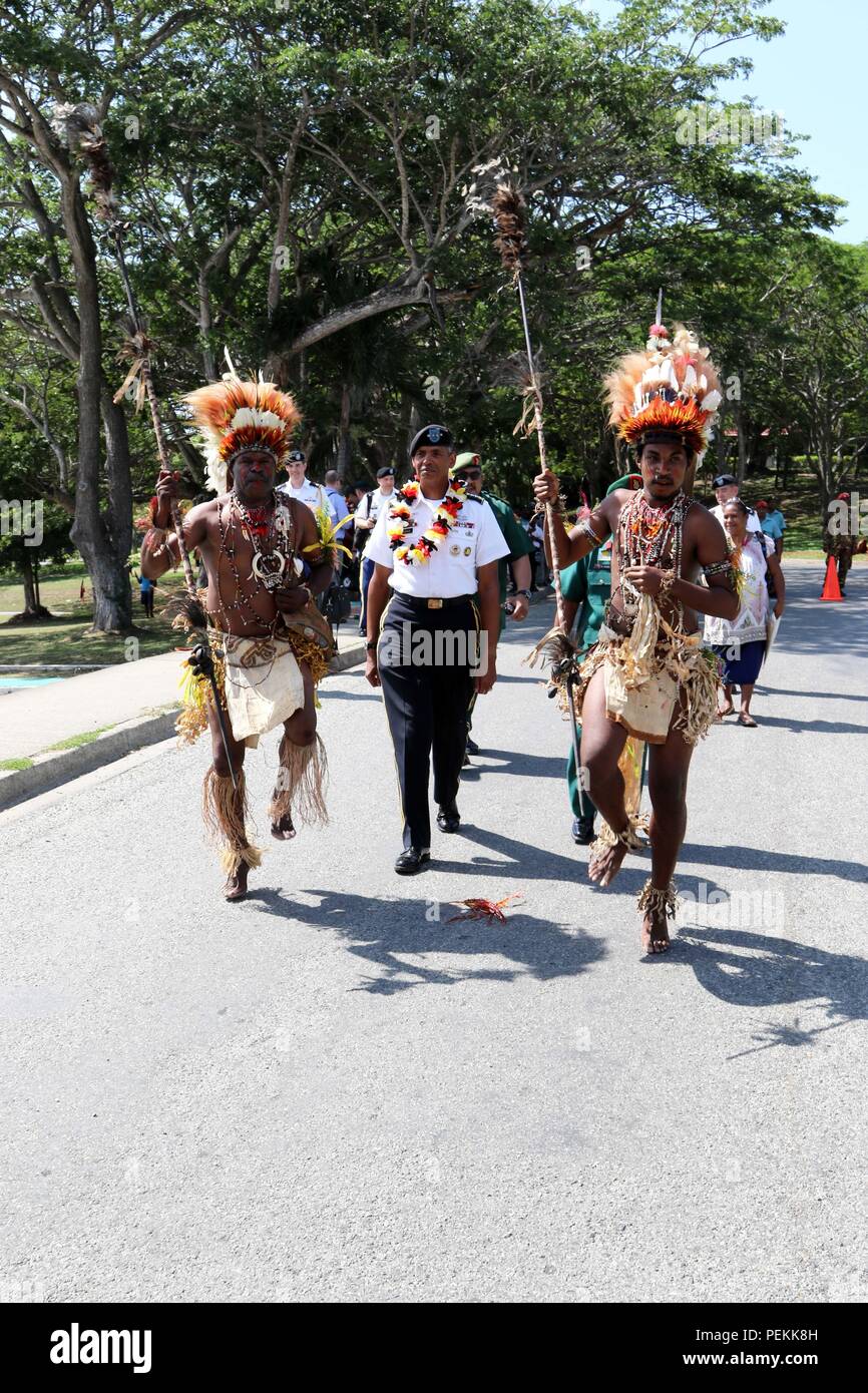 After being challenged by traditional Papua New Guinean warriors at ...