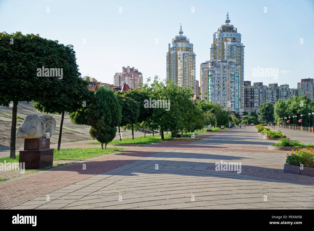 Footpath with shadows of tree, good weather Stock Photo - Alamy