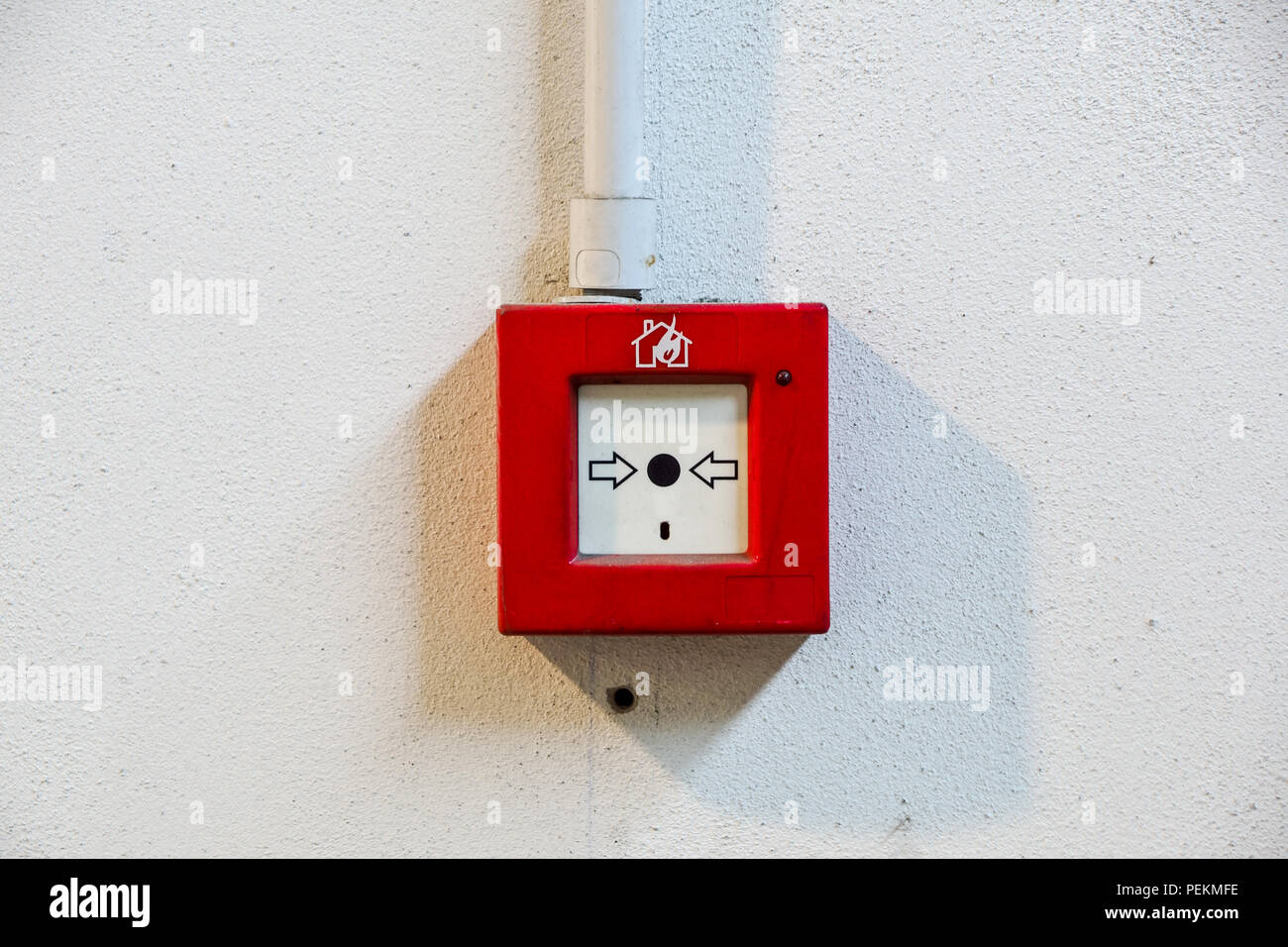 Fire alarm switch on white wall Stock Photo - Alamy