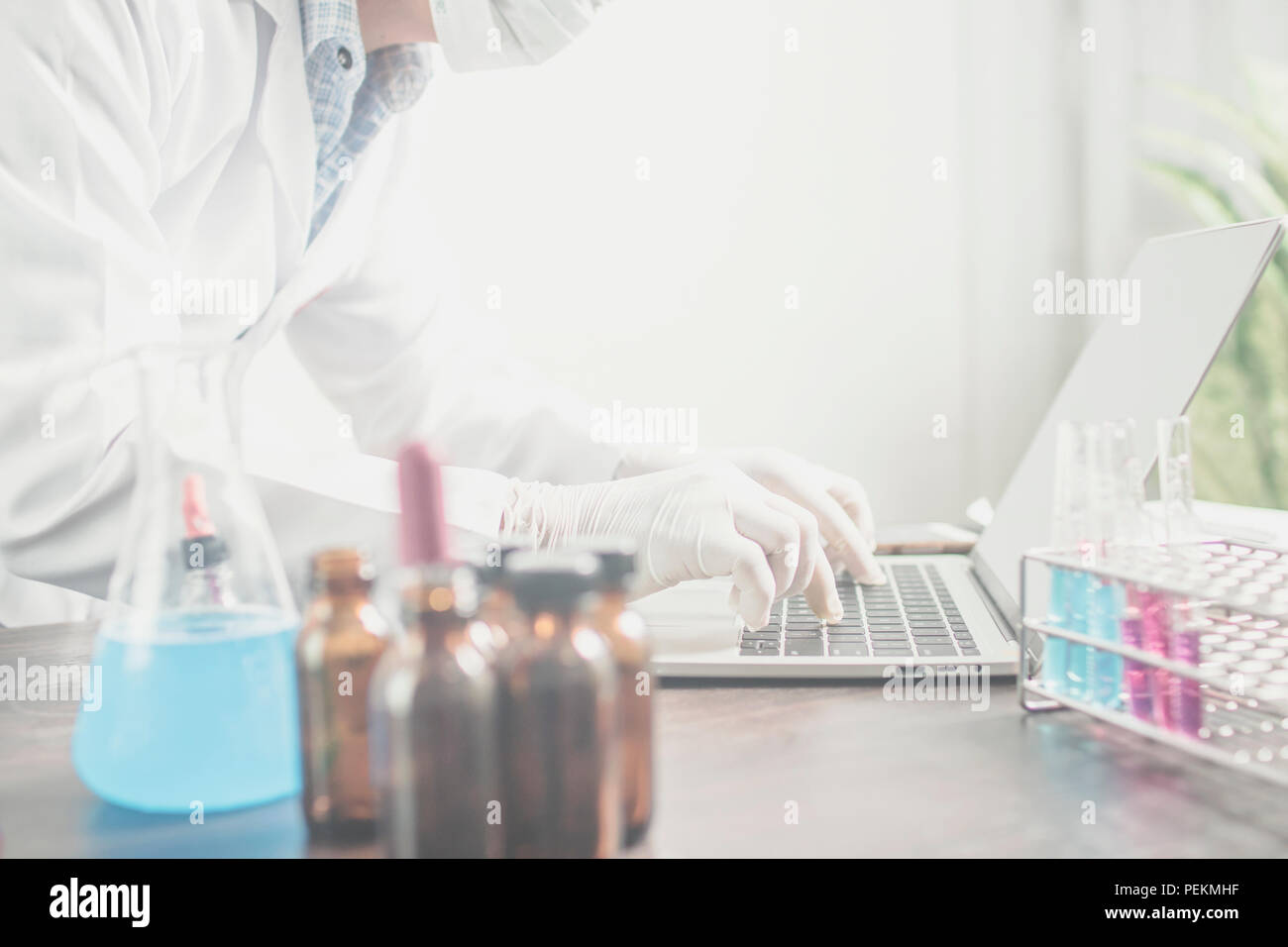 Scientist, researcher use laptop for searching information in science ...