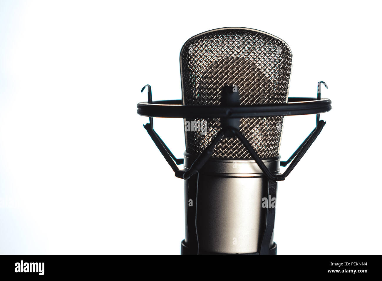 Studio microphone and microphone stand on white background Stock Photo ...