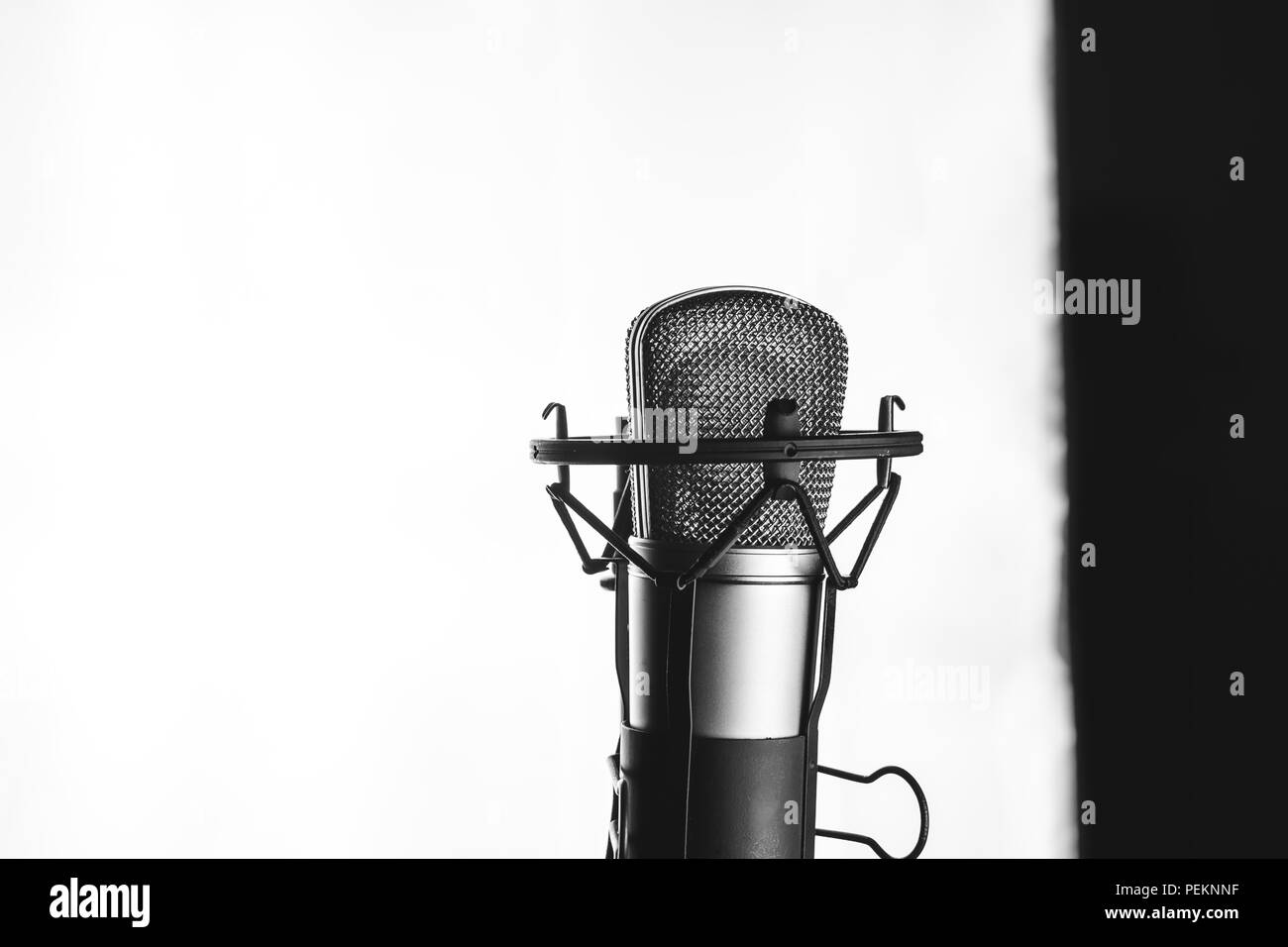 Studio microphone and microphone stand on white background Stock Photo ...