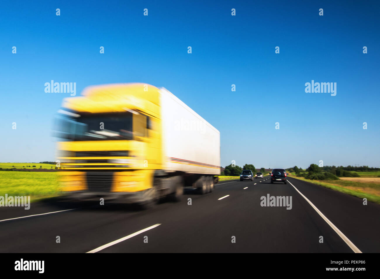 Long exposure blurred truck on the road Stock Photo - Alamy