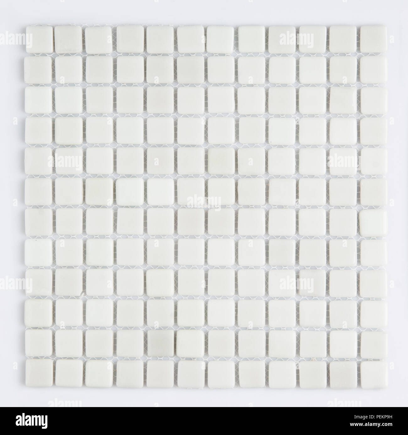 little white ceramic tile on a light background, top view, majolica ...
