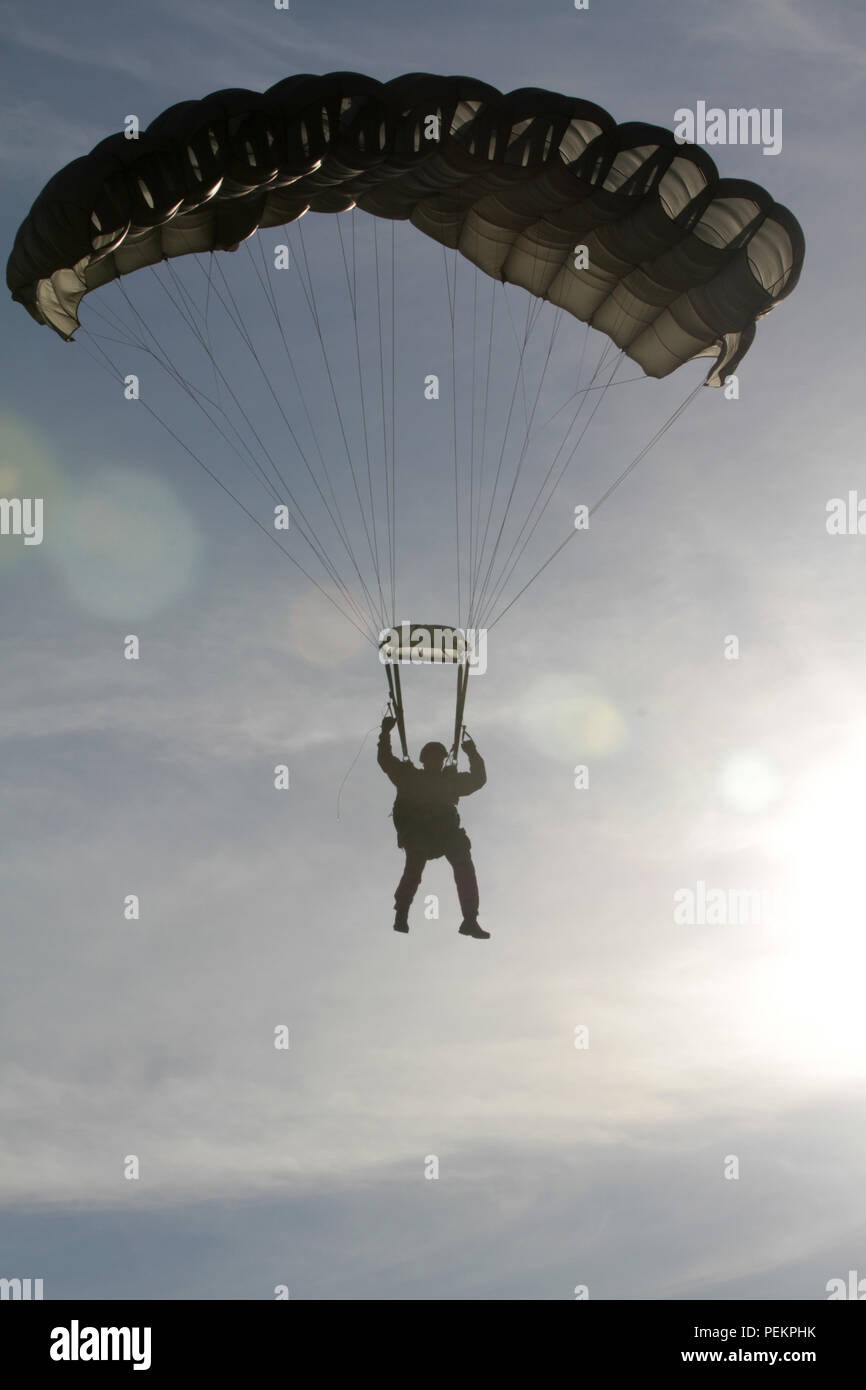 A U.S. Army paratrooper descends onto Luzon Drop Zone after a free fall ...