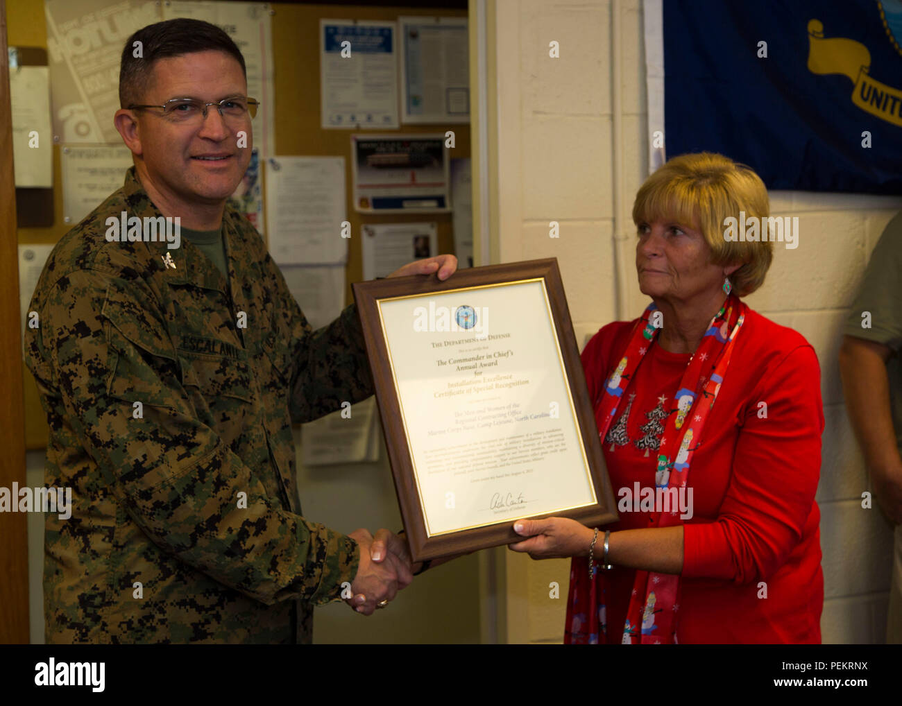 U.S. Marine Corps Col. Yori R. Escalante, left, deputy commander of ...